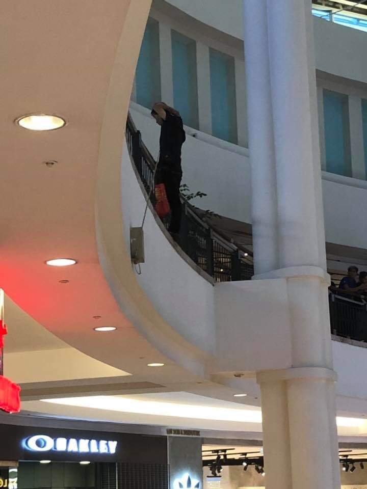 Man threatened to jump off 6th floor inside popular KL mall pulled to ...
