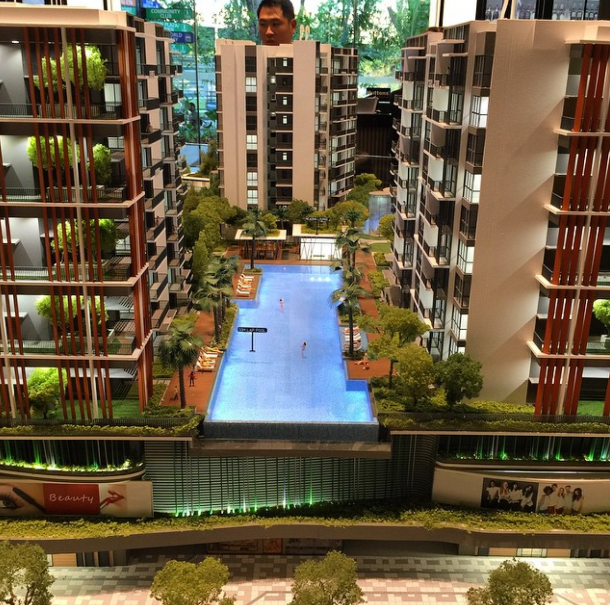 There are infinity pools in Yishun with HDB estate & MRT train tracks ...