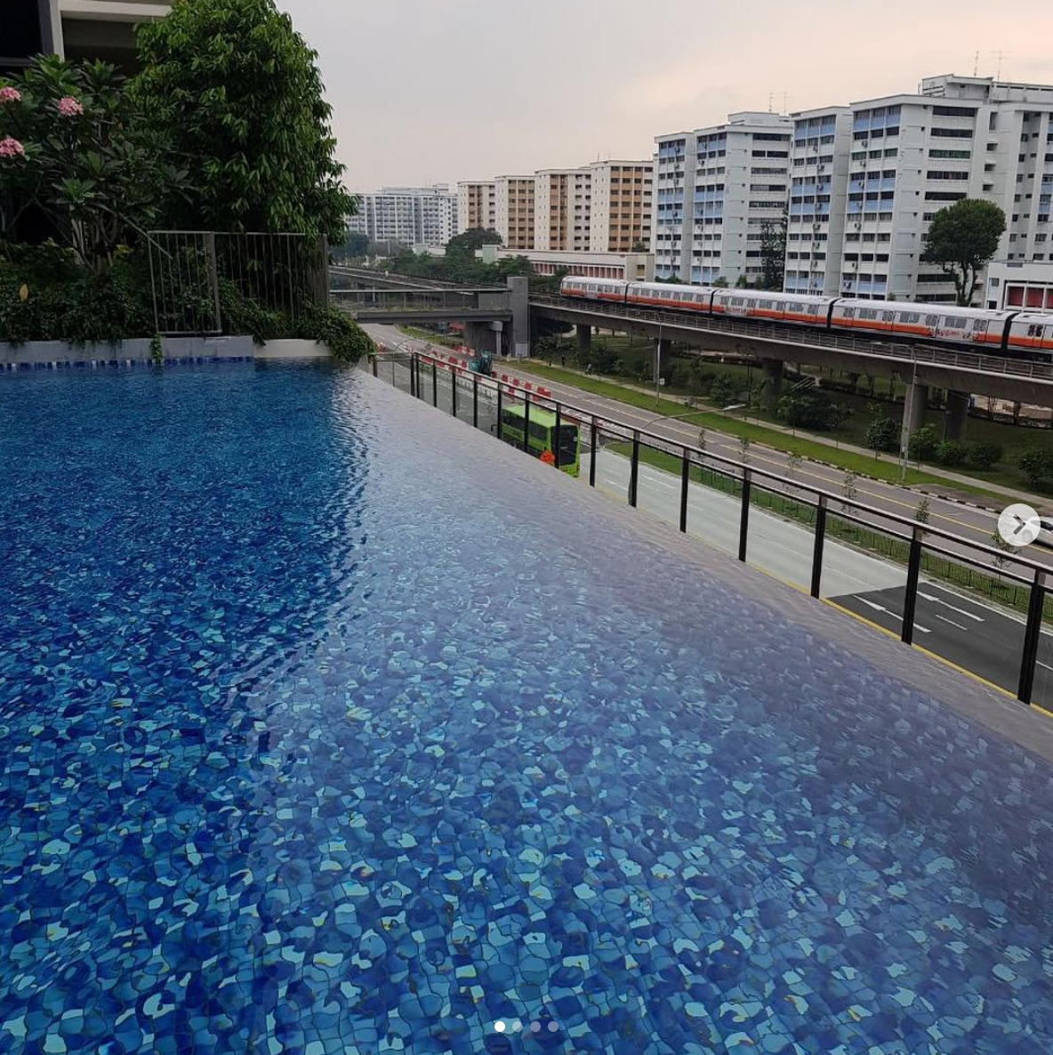 There are infinity pools in Yishun with HDB estate & MRT train tracks ...