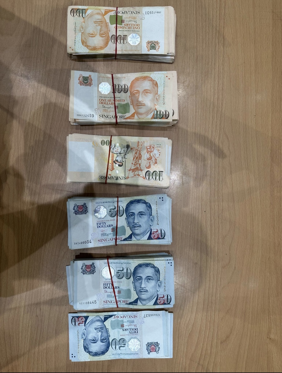 M'sian woman caught carrying over S$20,000 in undeclared cash at ...