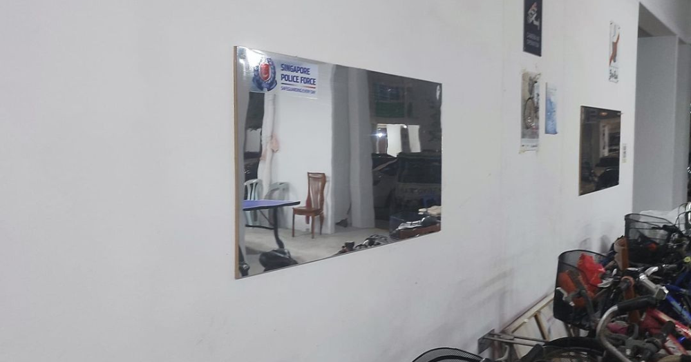 Some curious why & how police-mounted mirrors at HDB void decks deter ...