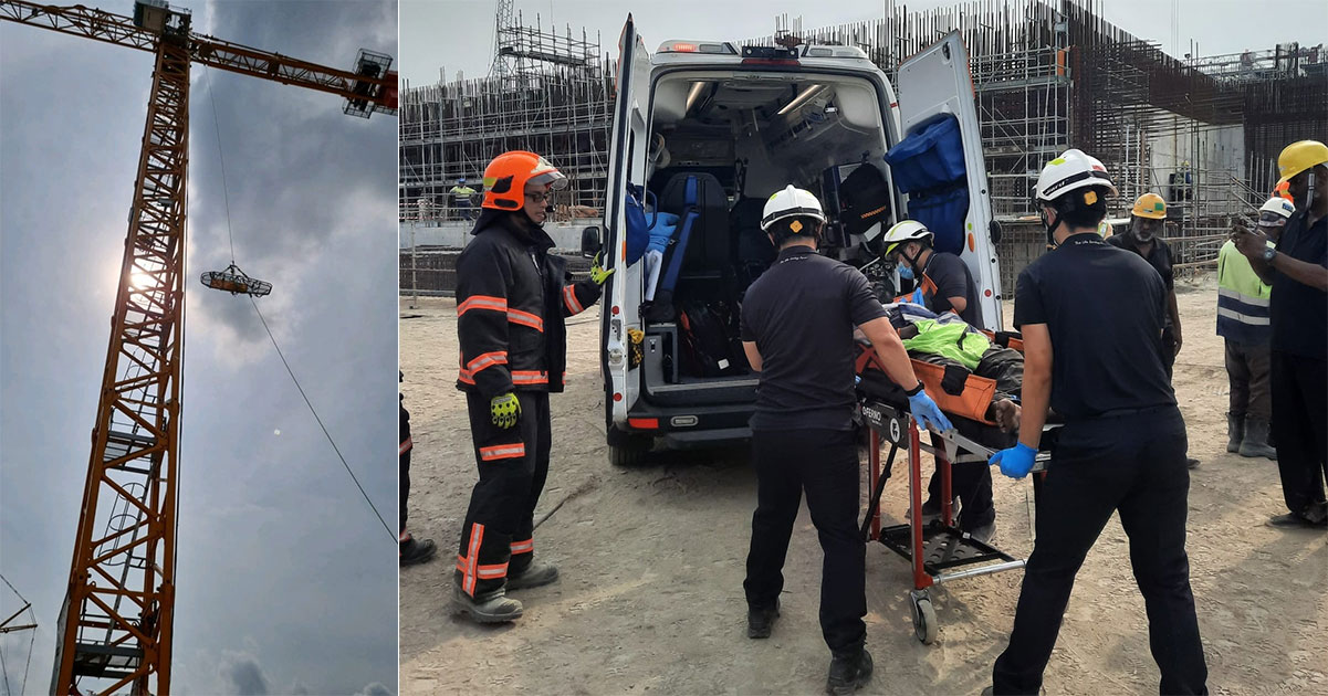 Elite SCDF personnel climb 40m tower crane in Tuas to lower man in ...
