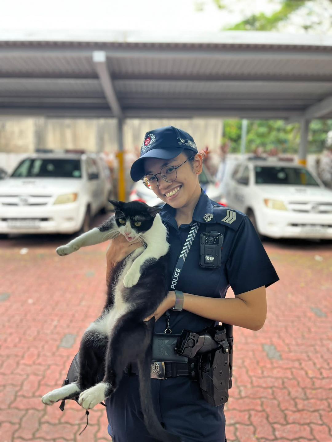 Jurong West police officer befriends Oreo, now police centre's 'in ...