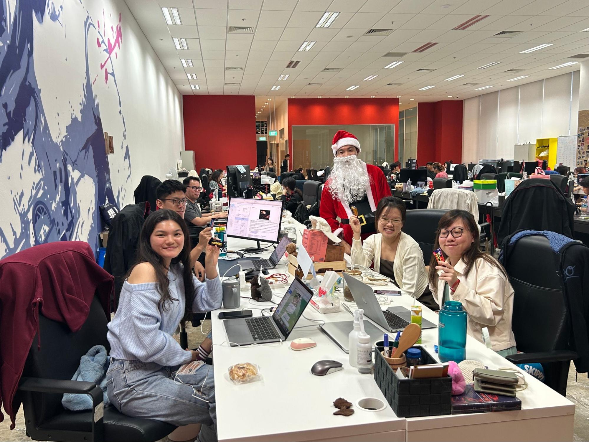 S’pore man, 30, dresses up as Santa Claus to give out chocolates in ...