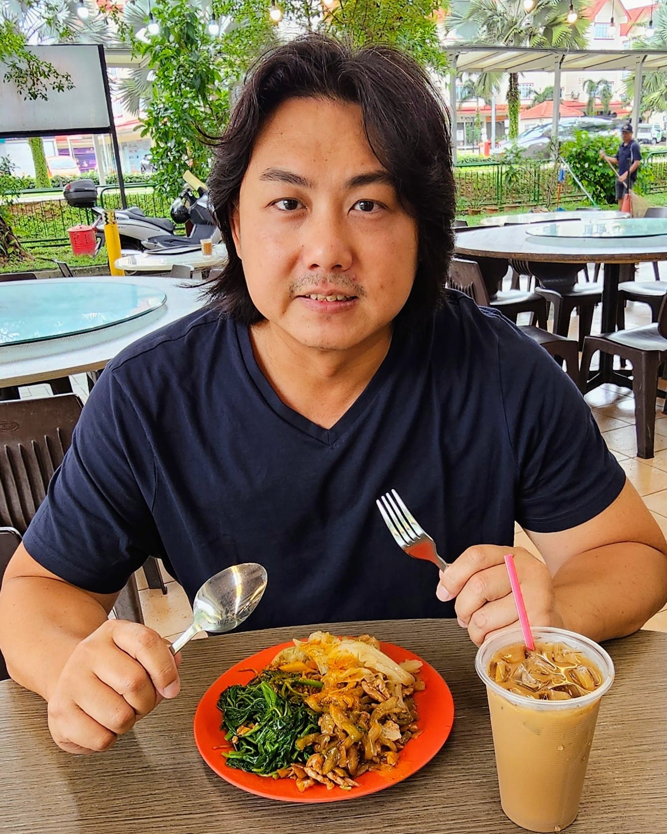 S'porean man eats cai png after epic 25,000km drive across 23 countries ...