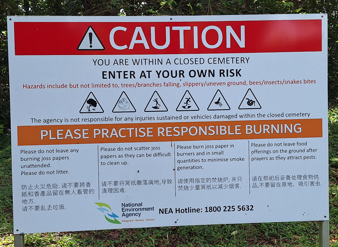NEA: S'pore cemetery sign warning against ghosts doctored with sticker ...