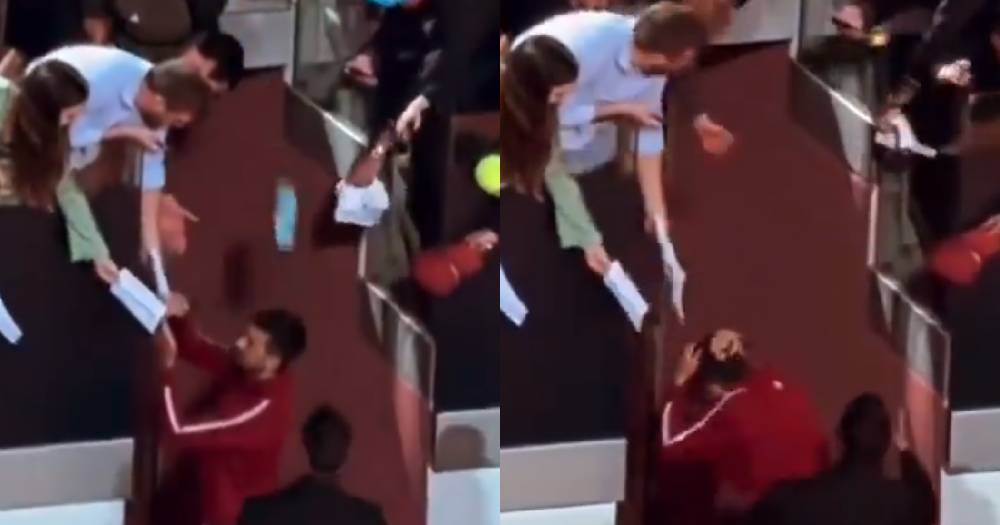 Novak Djokovic accidentally hit on head by fan's water bottle after ...