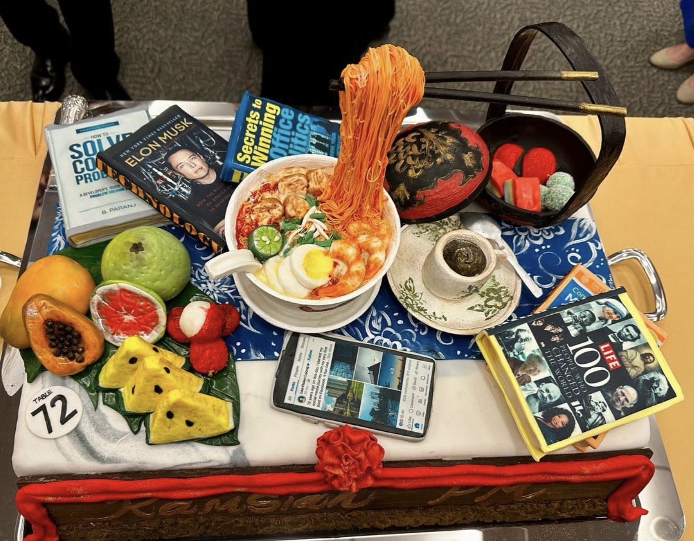 PAP MPs give PM Lee cake saying 'kamsiah' at his last parliament ...