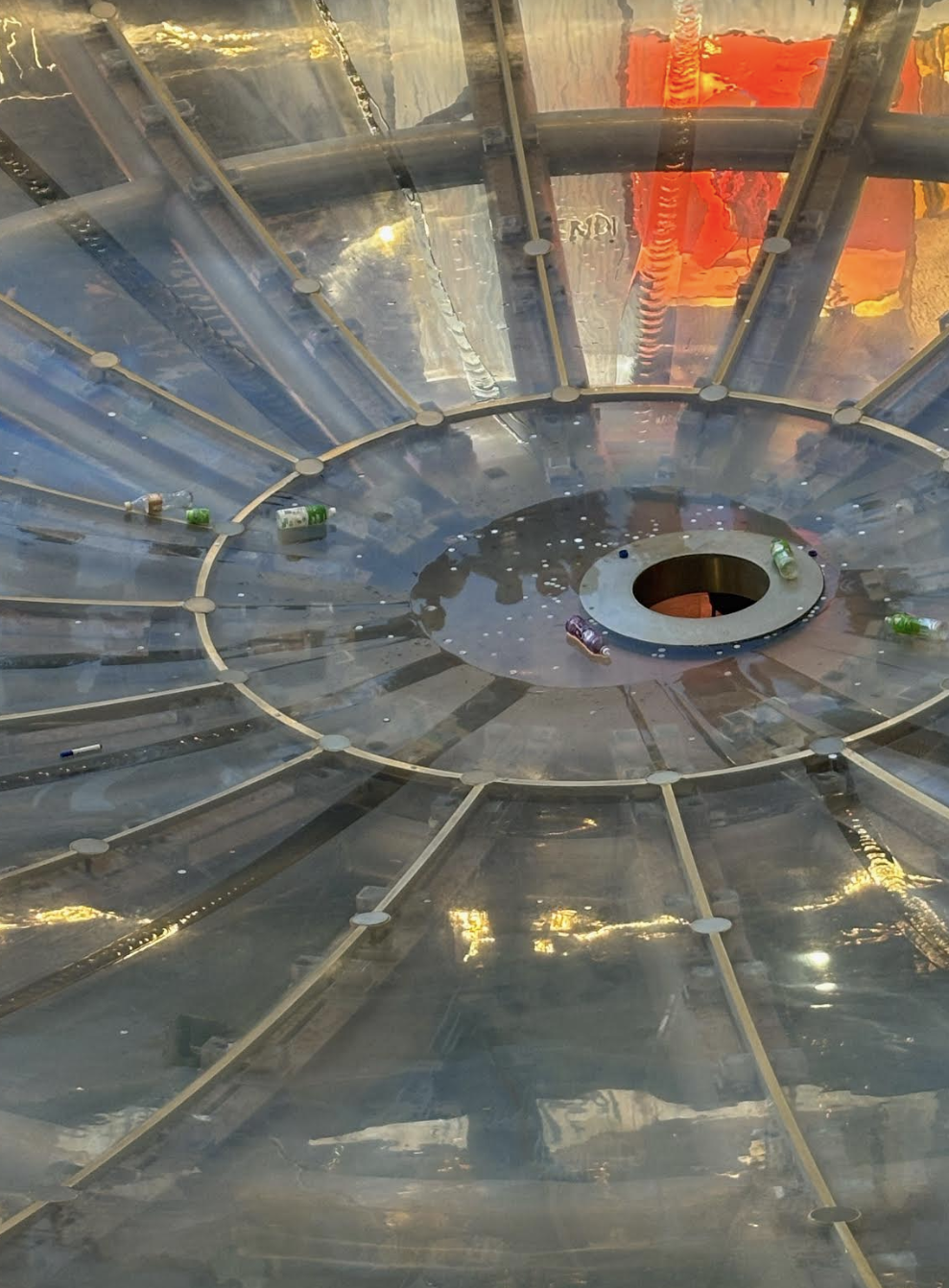 Teens throw plastic bottles, coins into MBS water feature, contemplate ...