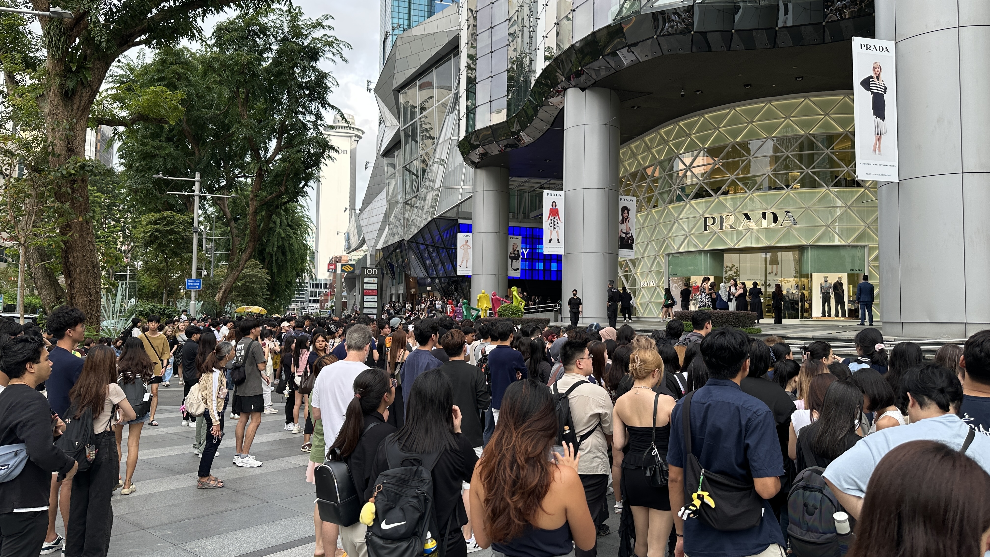 Hundreds show up for Prada boutique opening at ION Orchard to catch a ...
