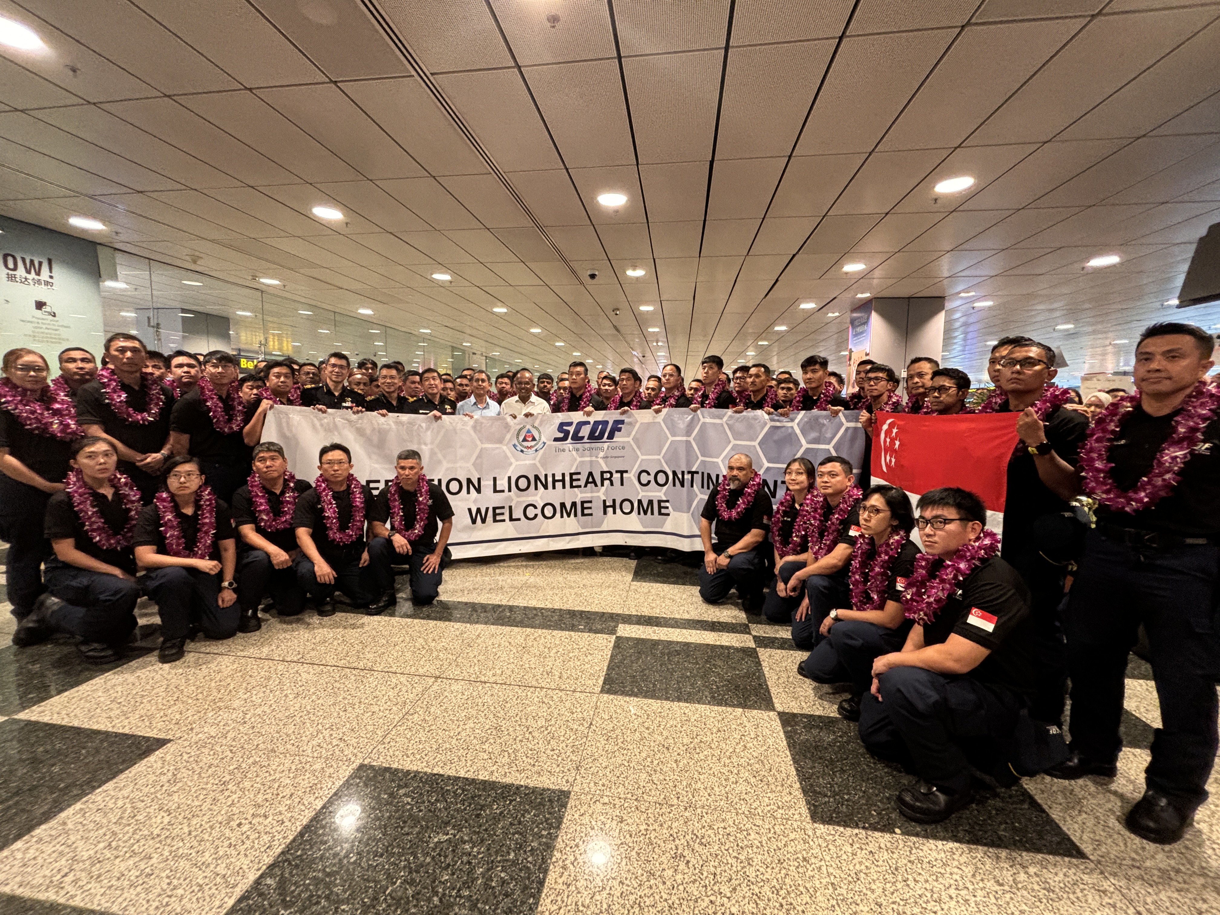 'Thank you for your service': Around 400 people welcome SCDF contingent ...