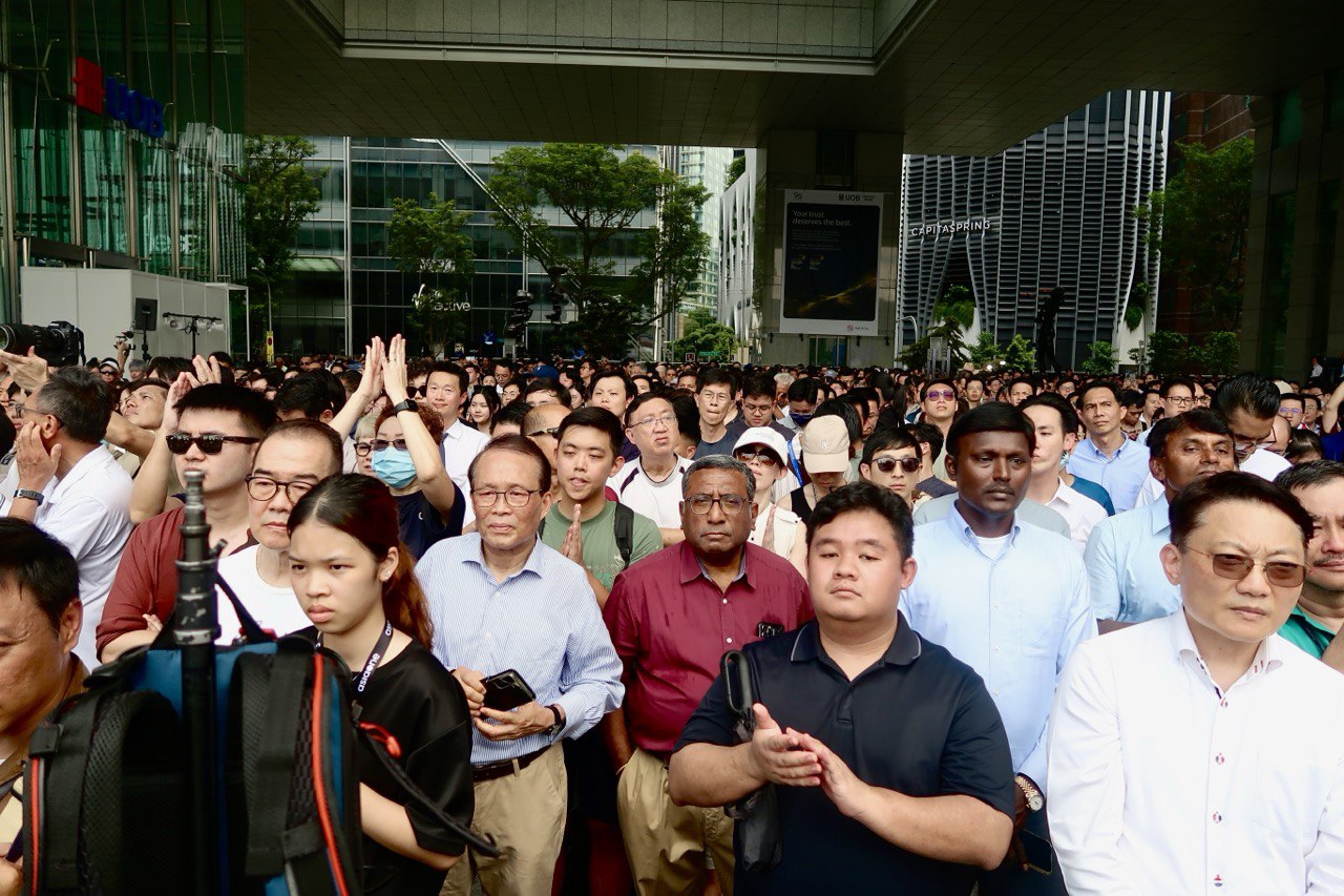 Office workers, as well as GE2025 opposition candidate, attend PAP ...