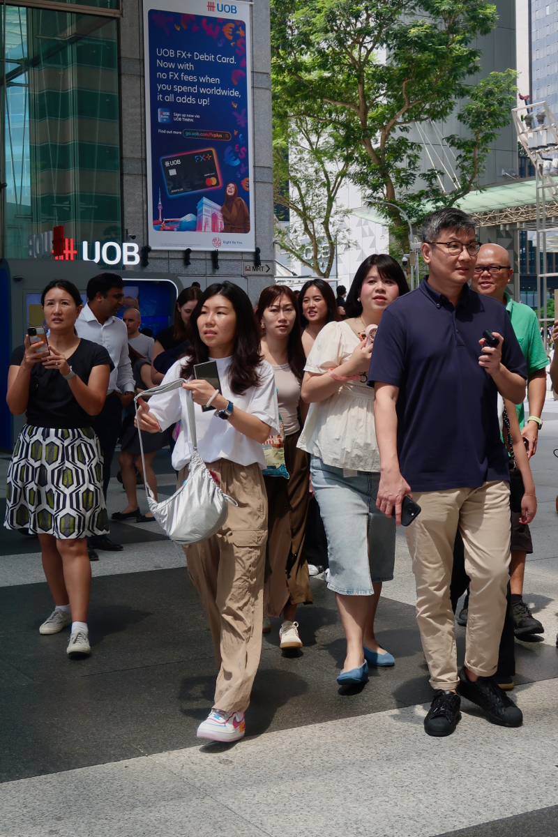 Office workers, as well as GE2025 opposition candidate, attend PAP ...
