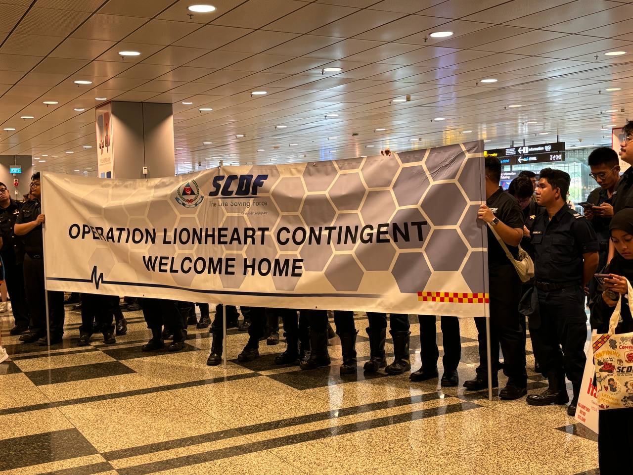 'Thank you for your service': Around 400 people welcome SCDF contingent ...