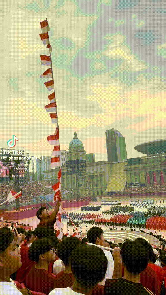 NDP rehearsal audiences stack flags to see whose is higher causing view ...
