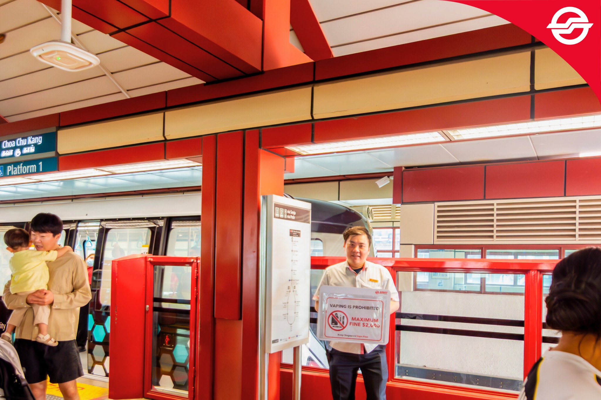 SMRT staff personally reminds passenger with sign that vaping leads to ...