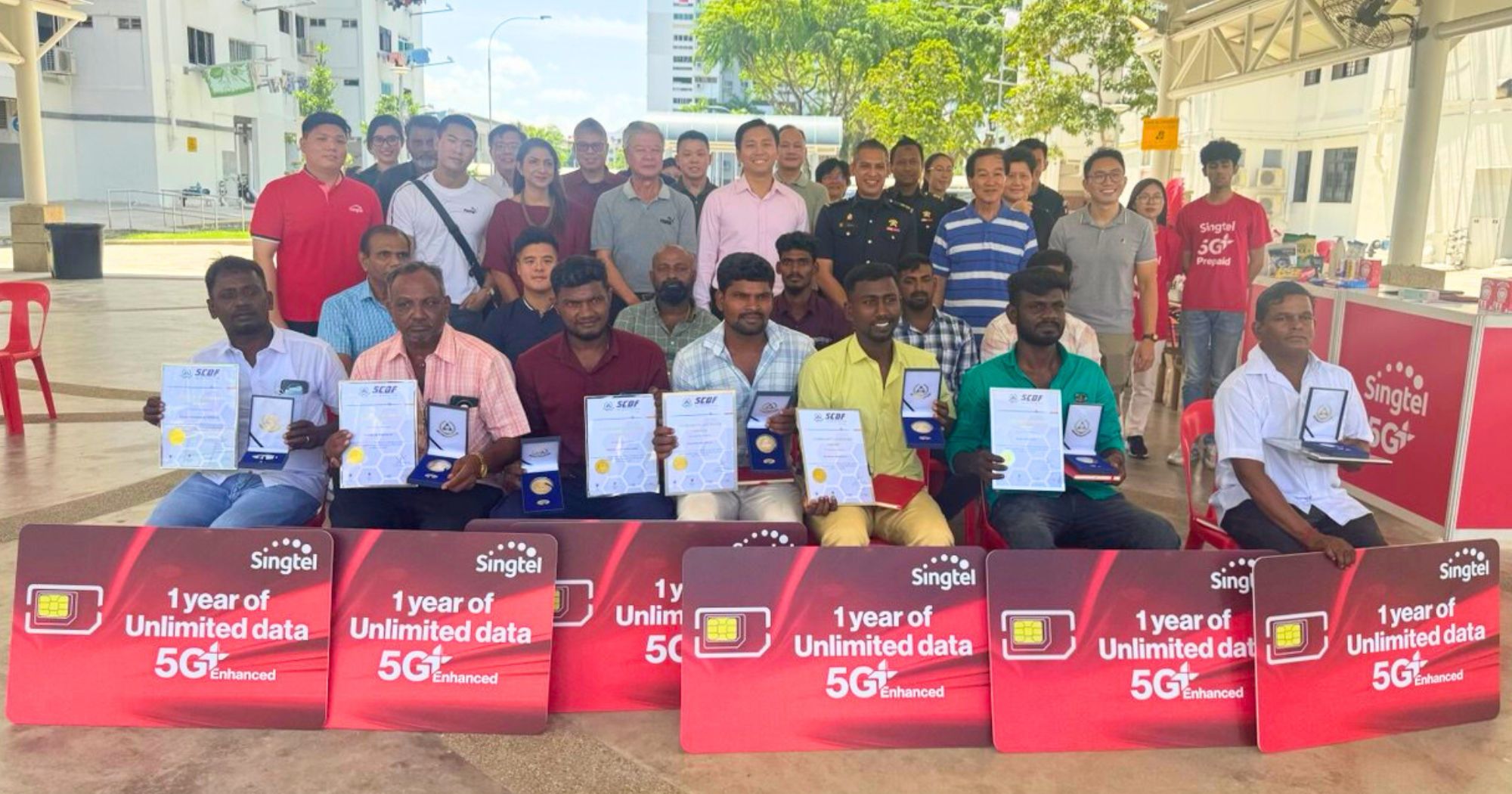 7 migrant workers awarded SCDF Community Lifesaver Award for saving ...