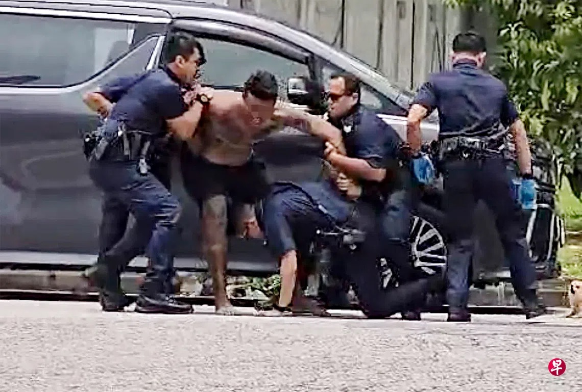 Shirtless man, 41, wanted for drug offences, tries to bite police ...