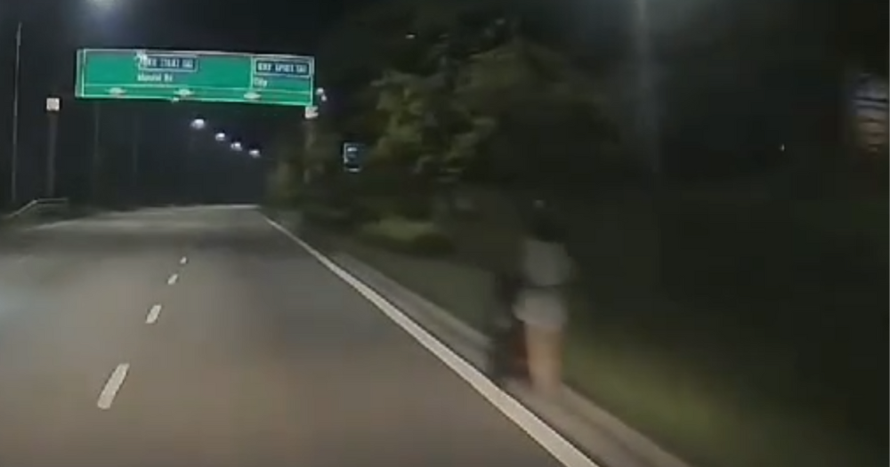 Woman in white spotted pushing stroller along KJE at 2:30am, elicits ...