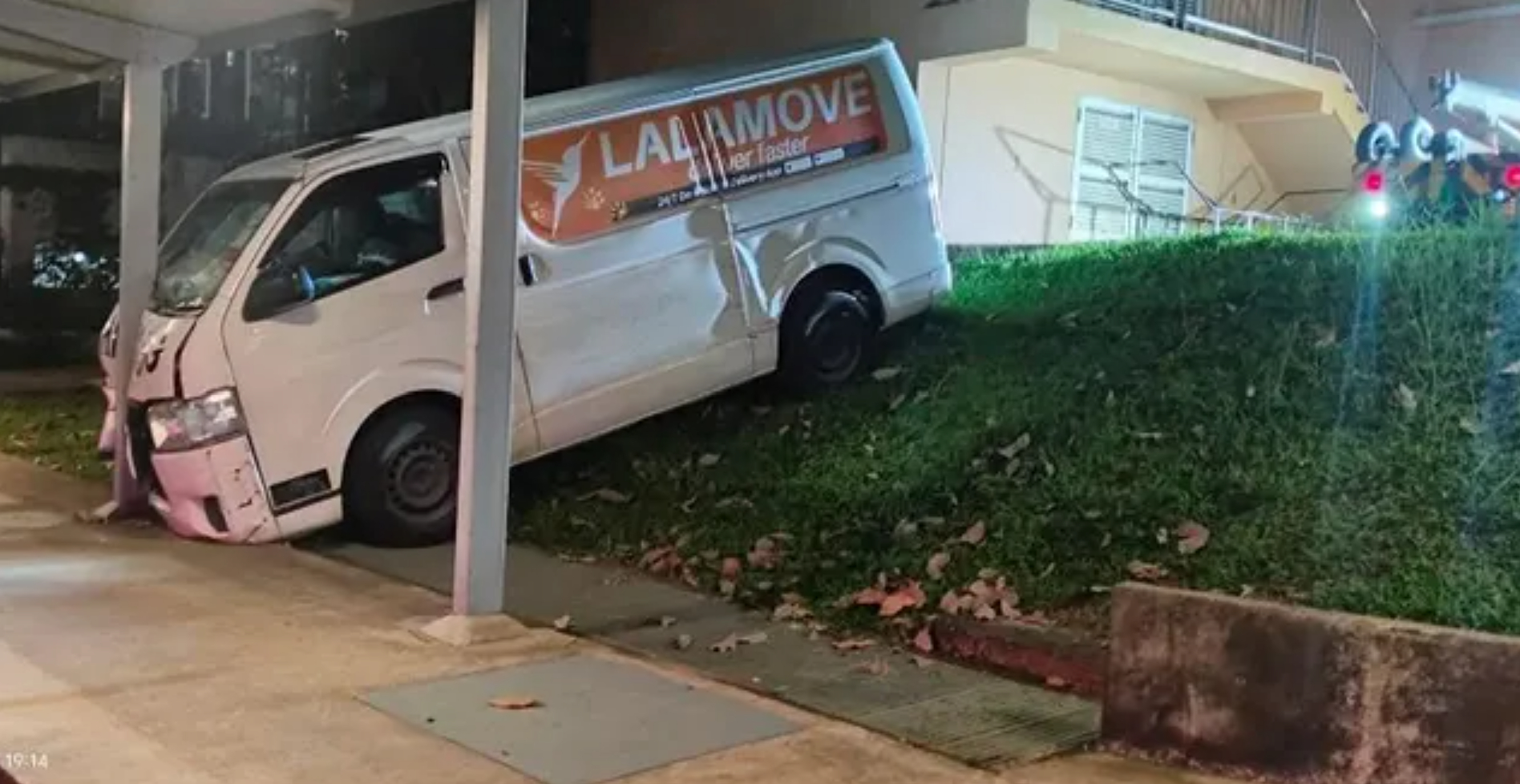 Van hits shelter pillar in Punggol, woman, 45, assisting with ...