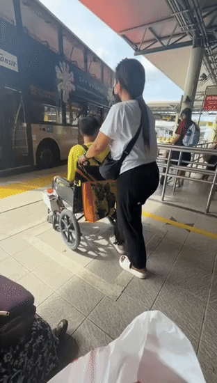 Domestic helper allegedly hits boy in wheelchair at Hougang bus ...