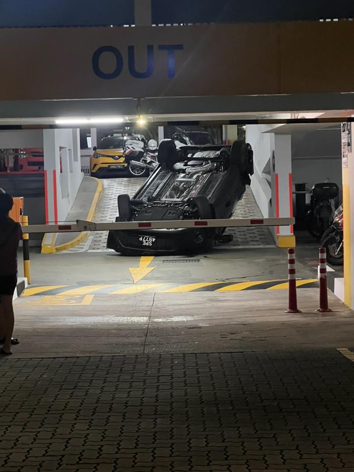 Car turns turtle at Woodlands carpark, driver, 41, assisting with ...